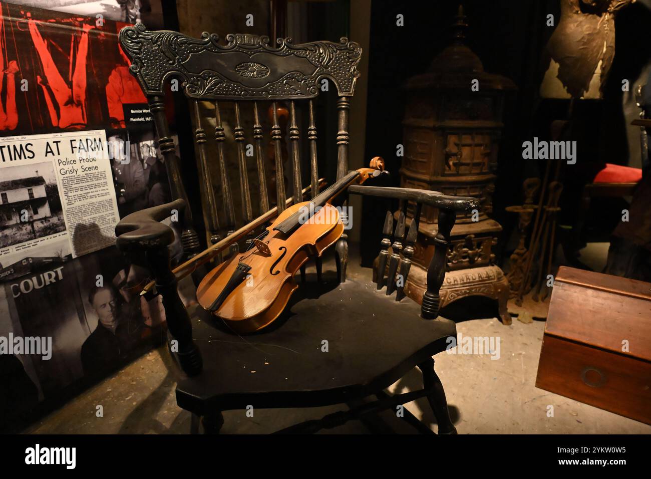 Violin and wooden chair used by serial killer Ed Gein Stock Photo - Alamy