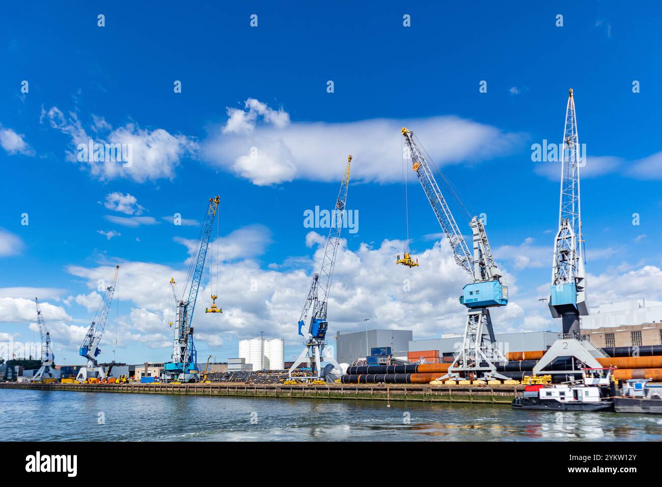 Cranes at port of Rotterdam, Netherlands. Logistics business, cargo ...