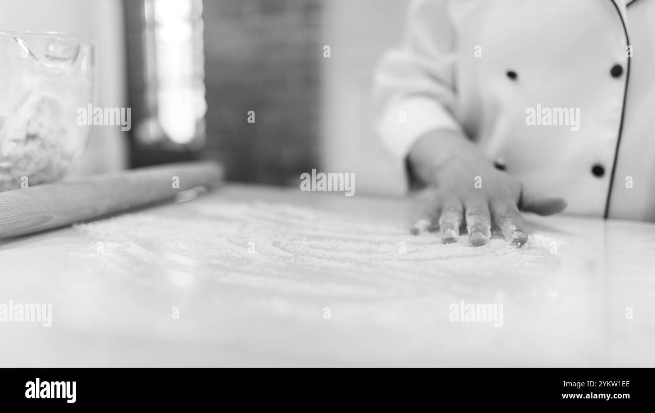 Pastry rolling Black and White Stock Photos & Images - Alamy