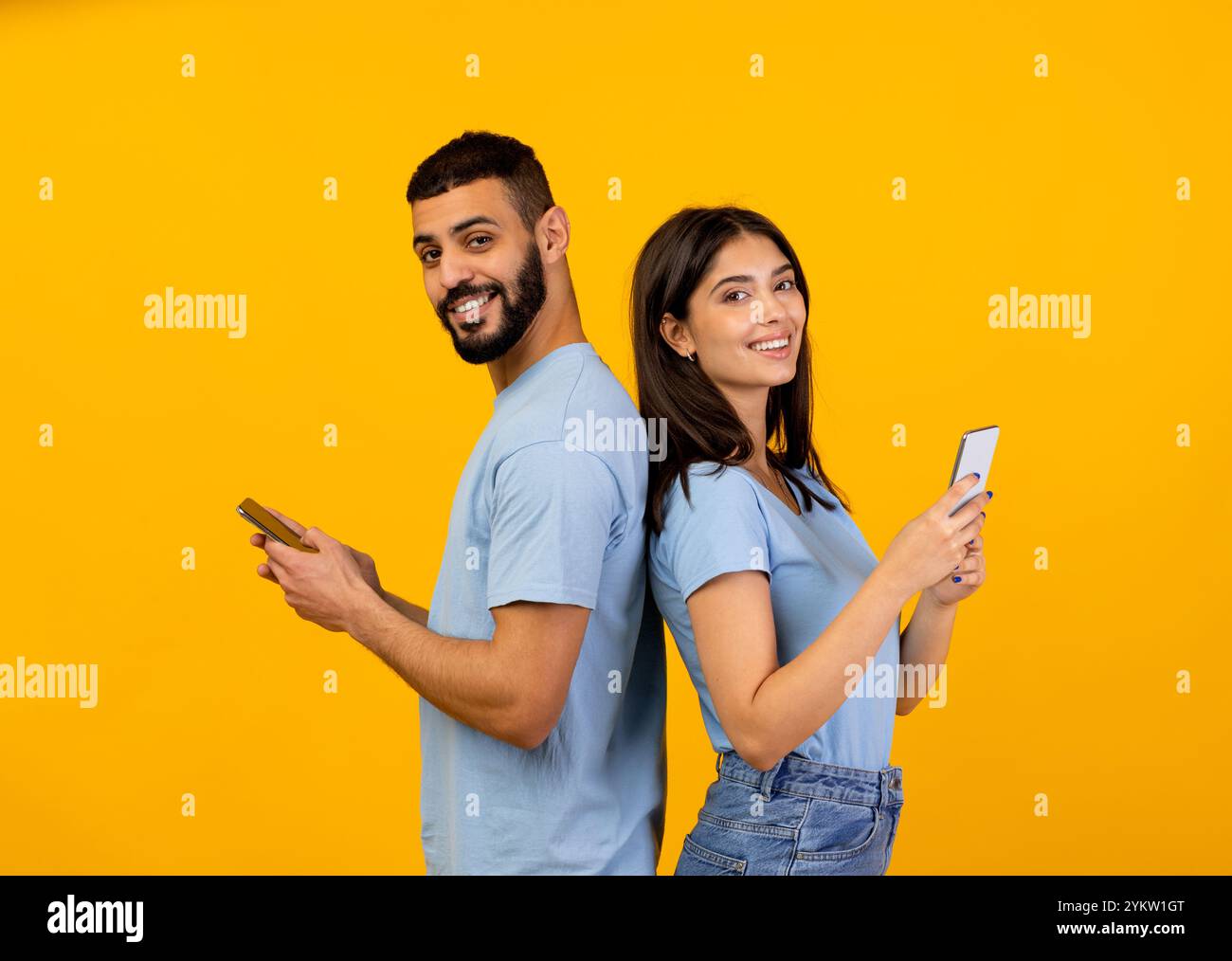 Woman standing modern smartphone device hi-res stock photography and ...