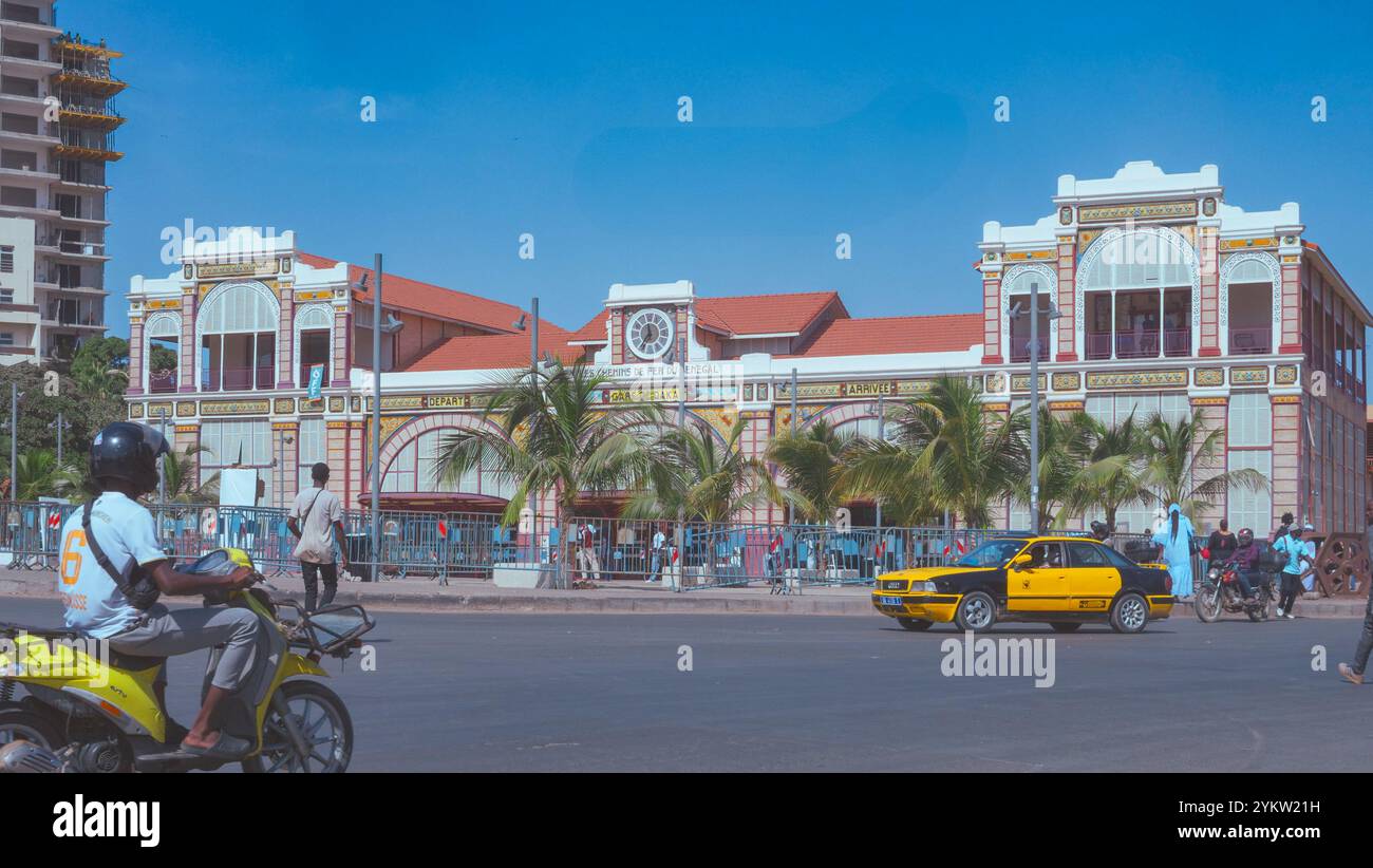 Gare station of Dakar, an ornate facade and a red roof, surrounded by ...