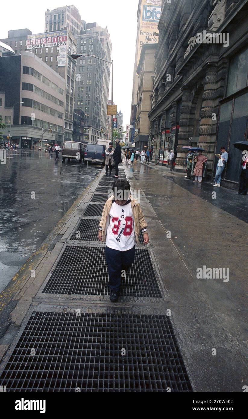 New York City, USA, 1982. Kid stepping over subway grates on the ...
