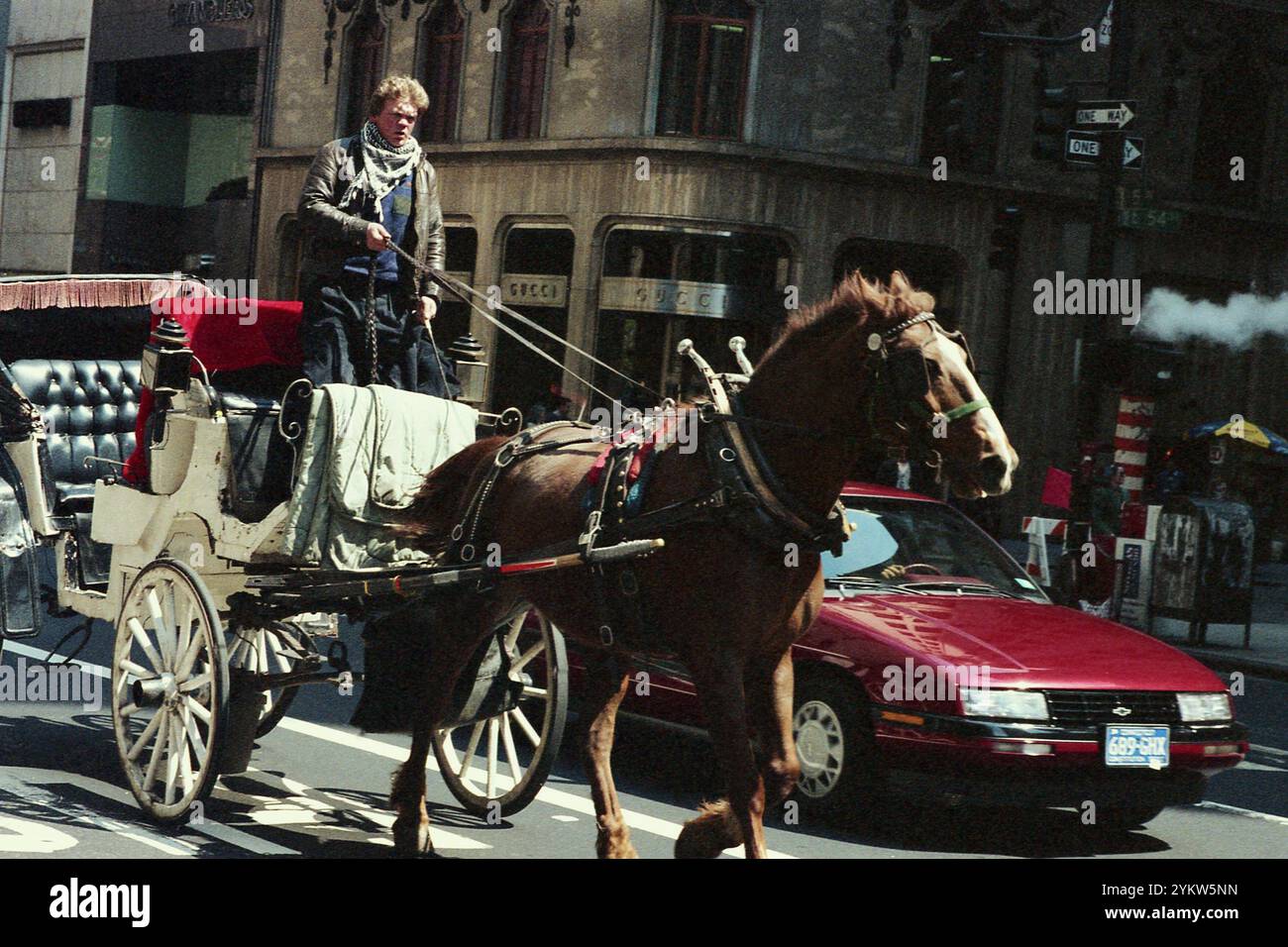 Horse drawn carriage and coachman in Manhattan, New York City, USA ...