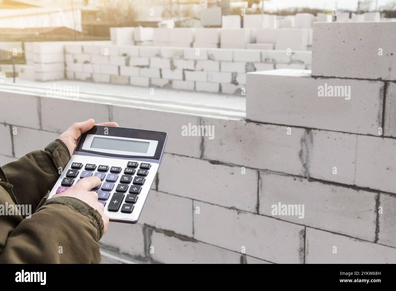 Construction costing concept. Calculating building materials ...