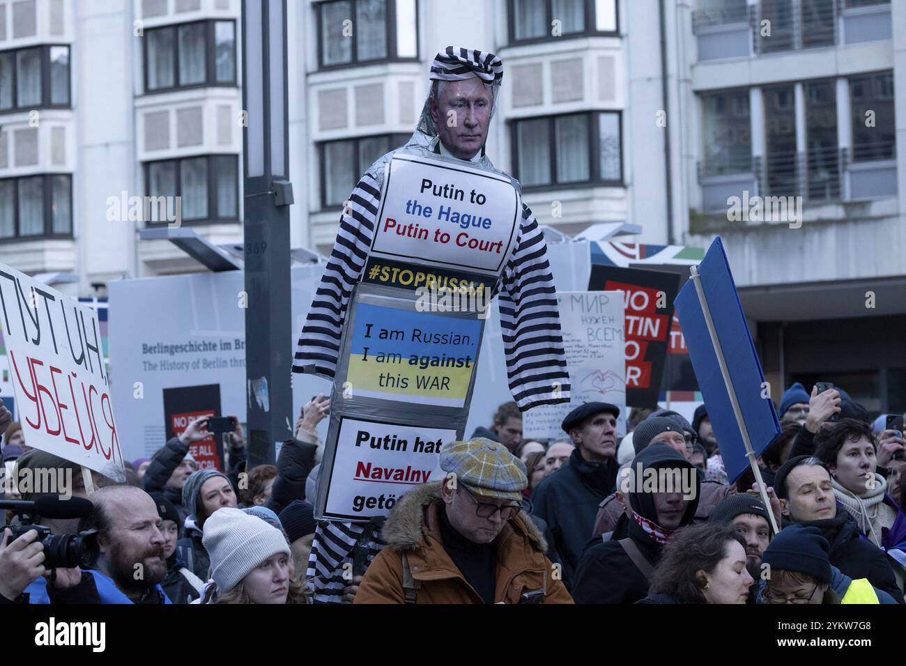Berlin, Germany, 17 November 2024: A demonstrator holds a cardboard ...