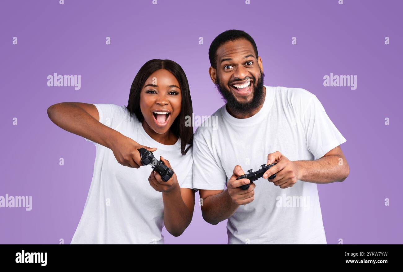 African man joysticks games hi-res stock photography and images - Alamy