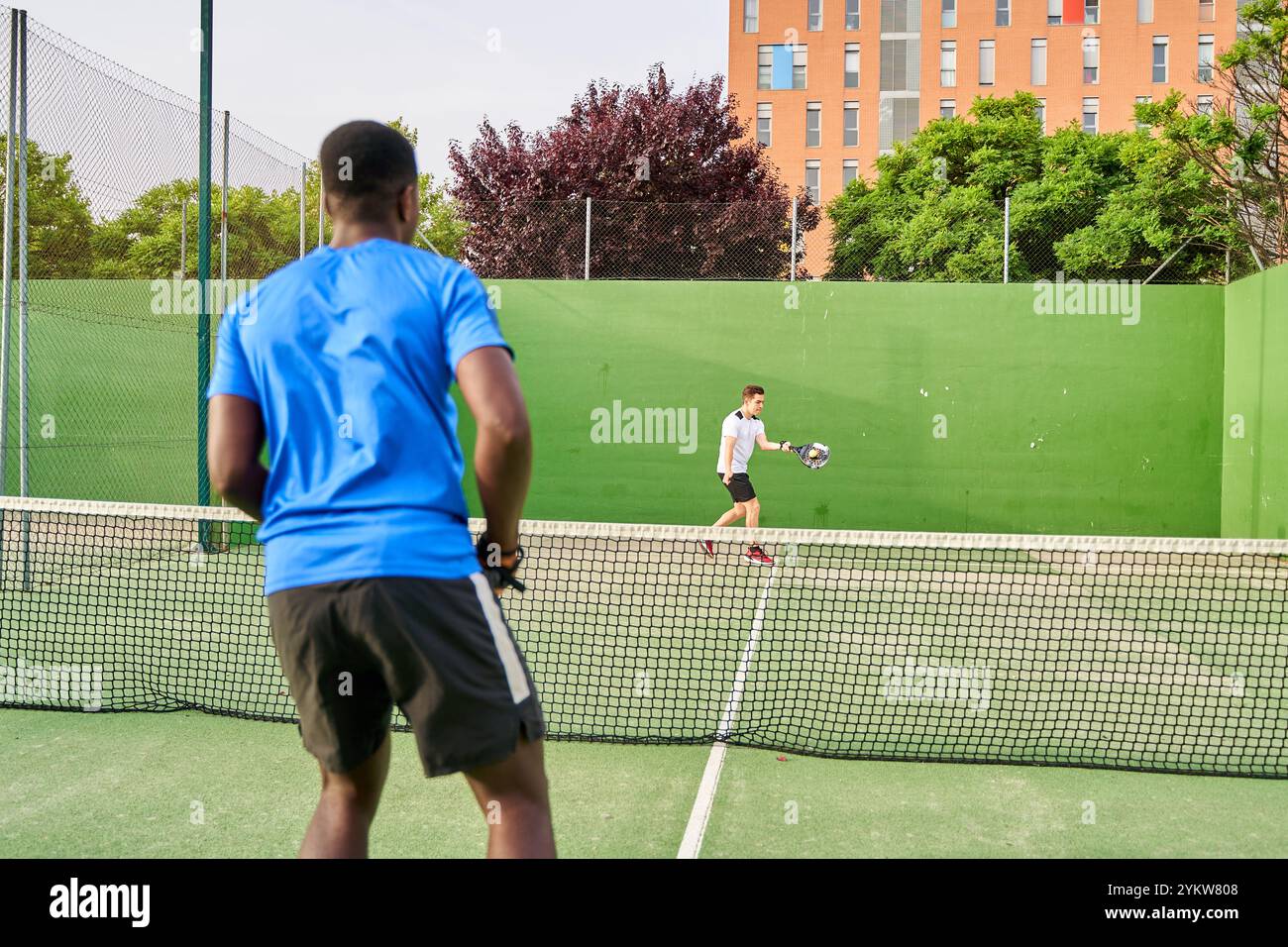 Male friends playing padel hi-res stock photography and images - Alamy