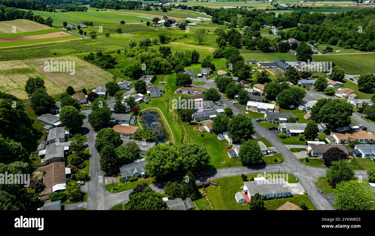 Aerial view of a tranquil rural community featuring various Mobile ...