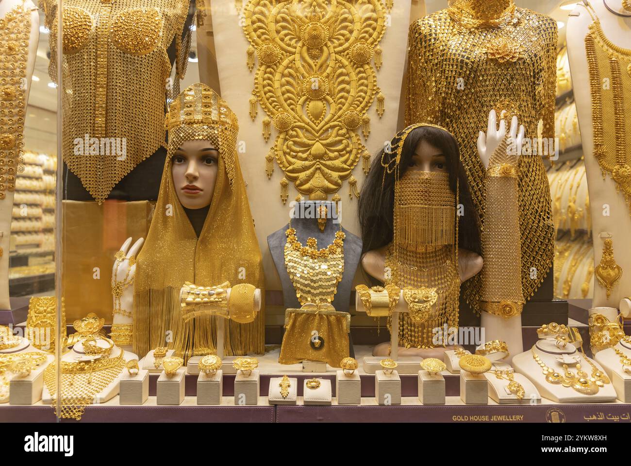 A picture of women's jewelry on a storefront at the Dubai Gold Souk ...