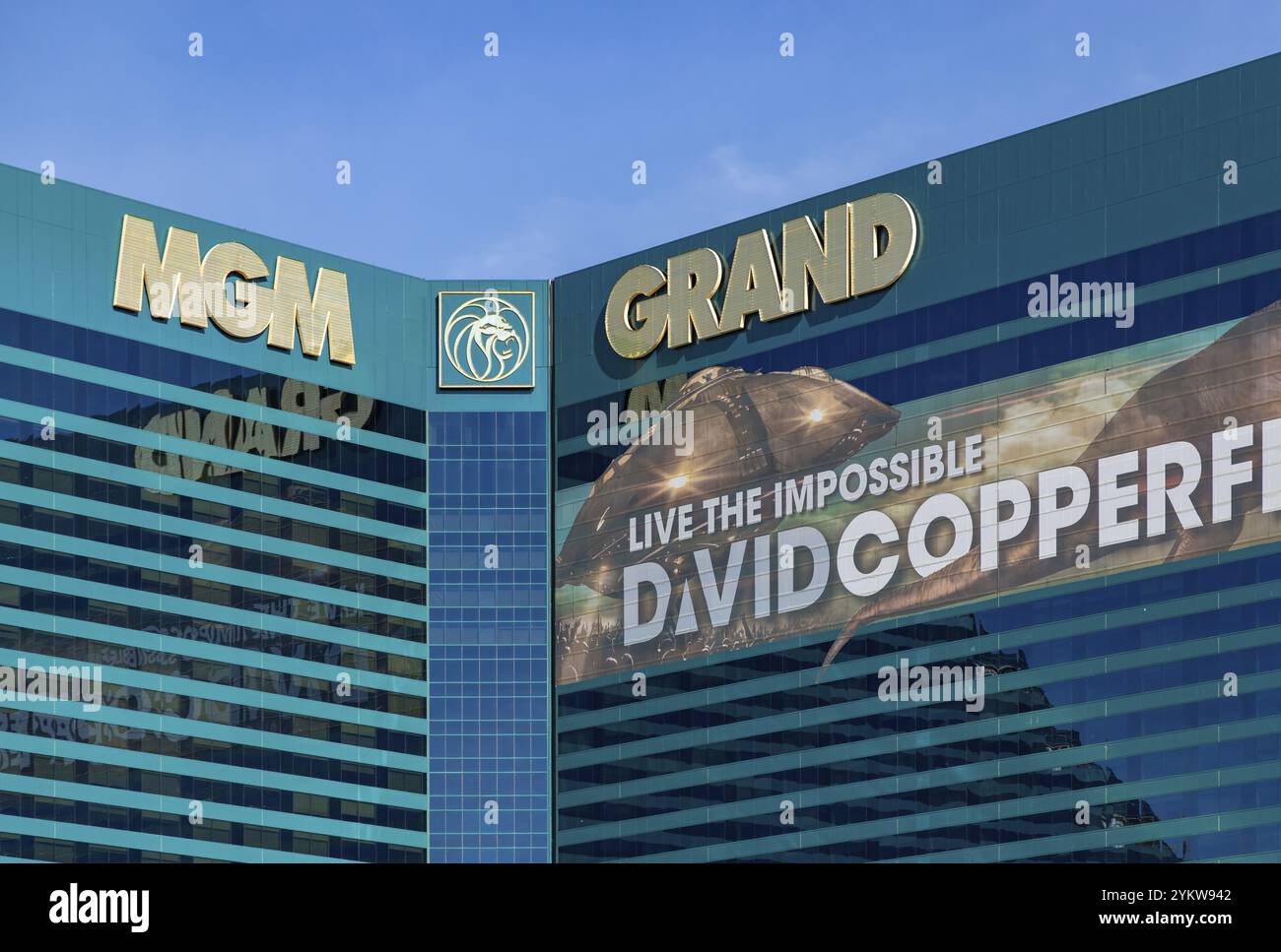 A close-up picture of the green facade of the MGM Grand with an ad from ...