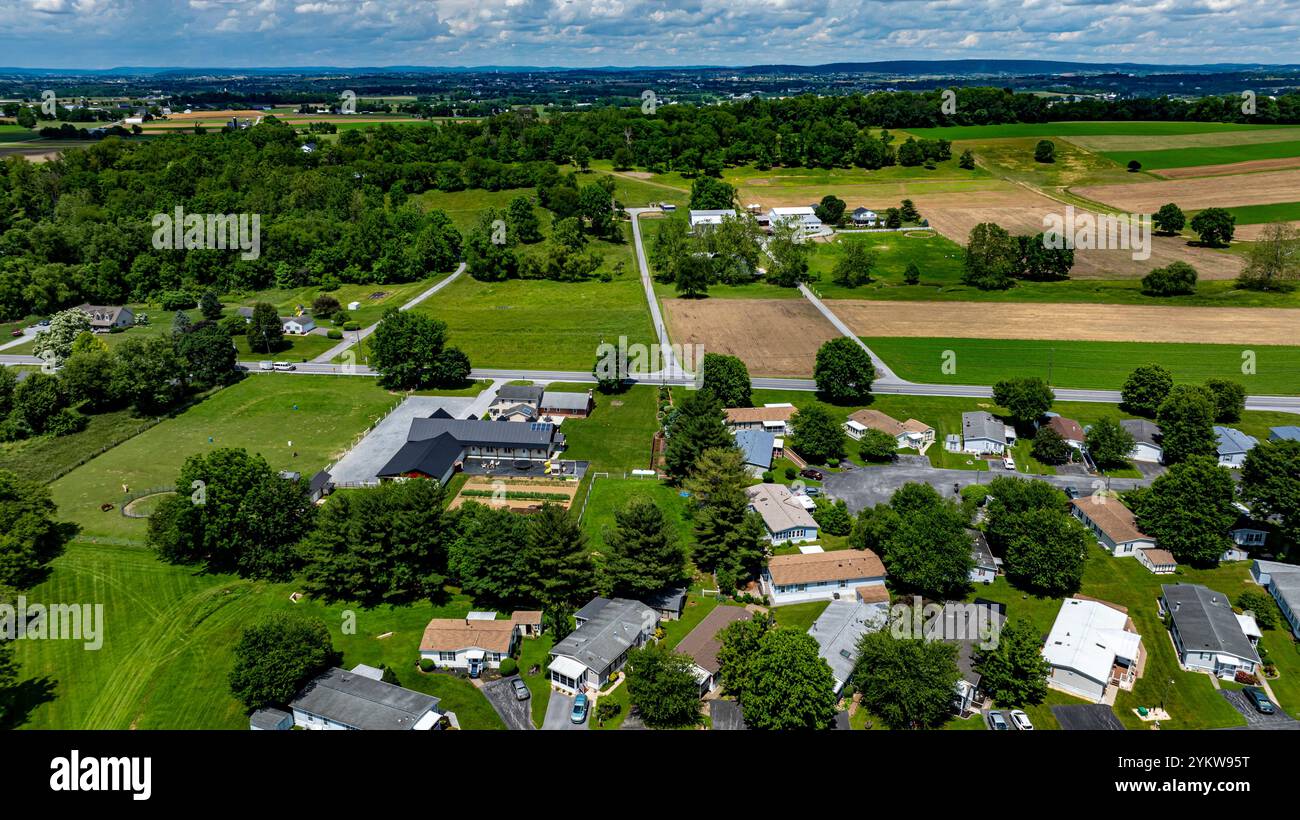 Aerial view of a tranquil rural community featuring various Mobile ...