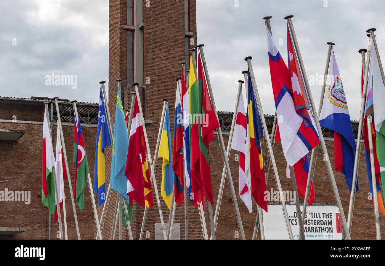 A picture of many country flags in front of the Olympic Stadium as part ...