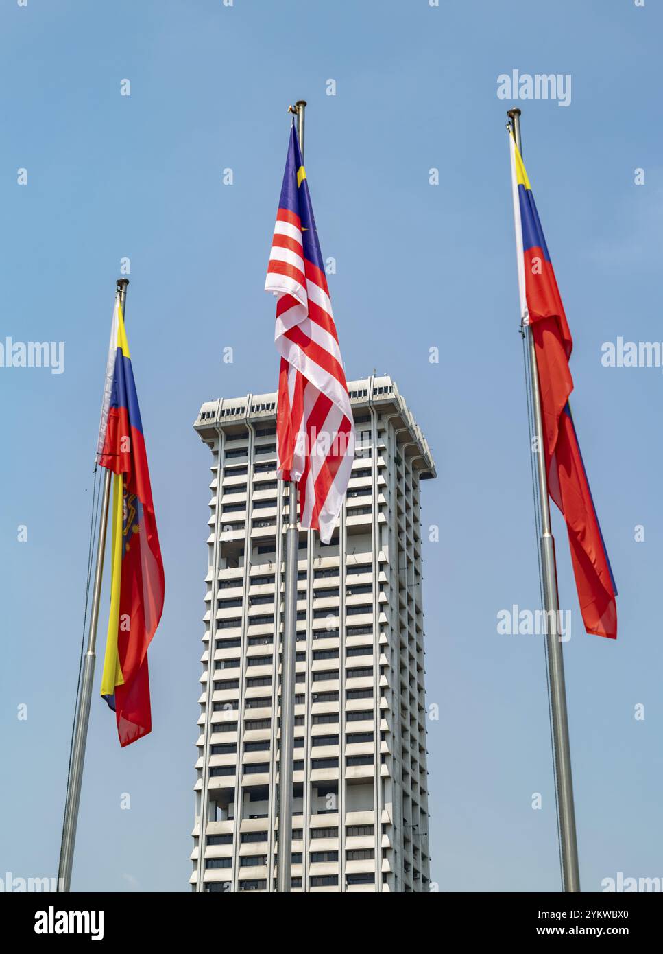 A picture of Malaysian and Federal Territories of Malaysia flags in front of the Royal Malaysia ...