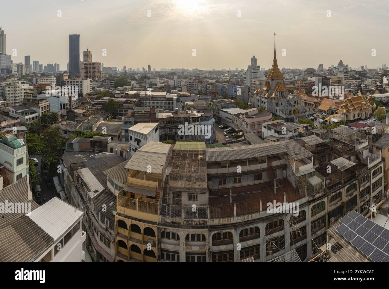 A picture of the roofs of the Samphanthawong, Bang Rak and Khlong San districts of Bangkok, with ...