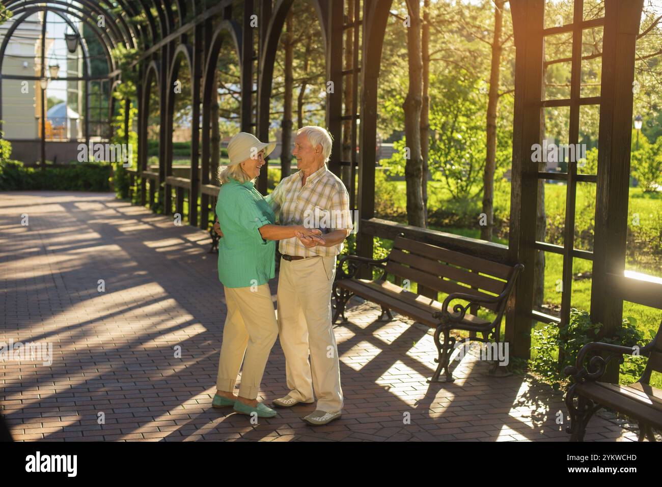 Elderly couple dancing. People looking at each other. We still love ...