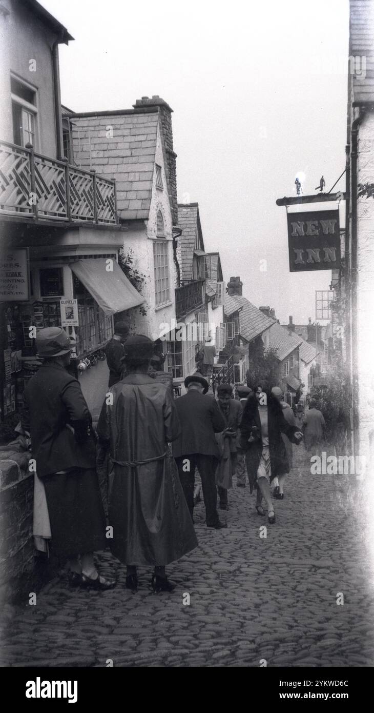 1930s, historical, the cobbled Main Street at the famous harbour ...