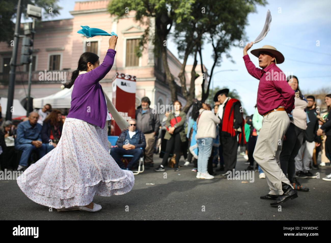 A couple dances an Argentinian folk dance at the Mataderos market in ...