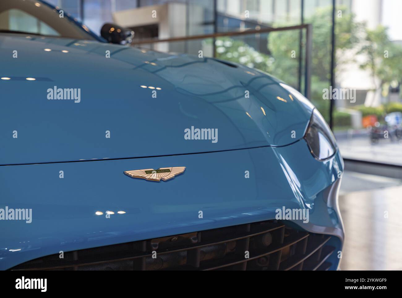 A picture of a blue Aston Martin Vantage Stock Photo - Alamy