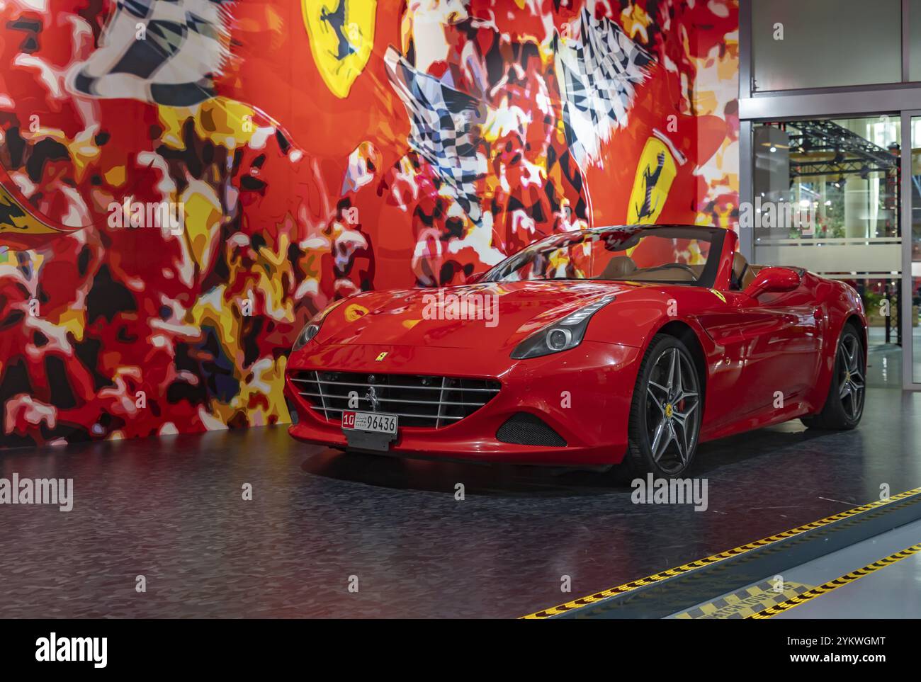 A picture of a red Ferrari California T at the gift shop of the Ferrari ...