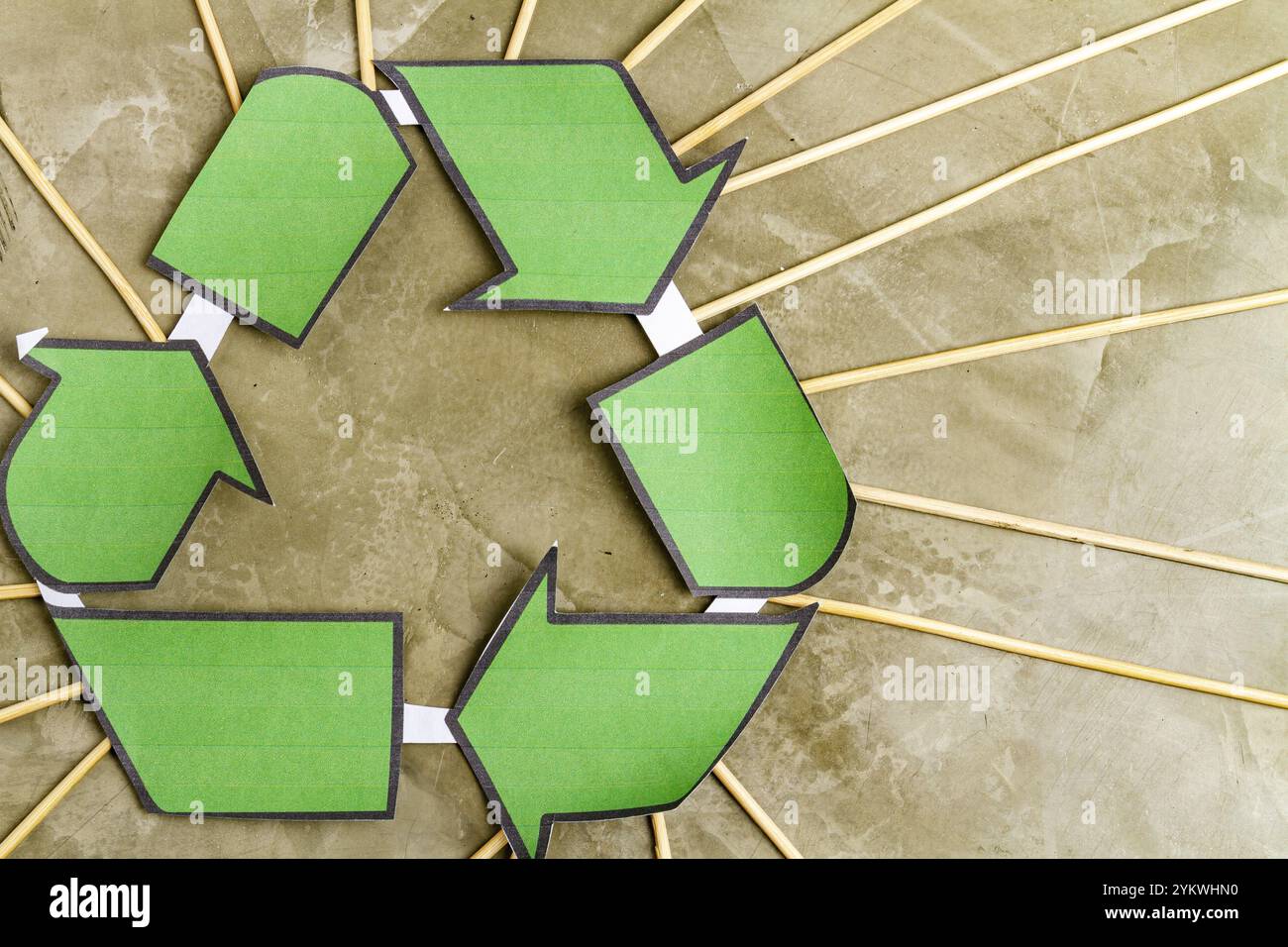 Close up green recycle sign and many wooden sticks. Green world concept ...