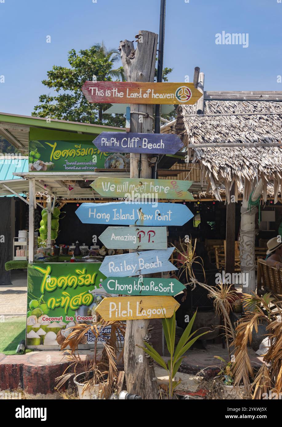A picture of direction signs on Ton Sai Beach, at the Ko Phi Phi Don ...