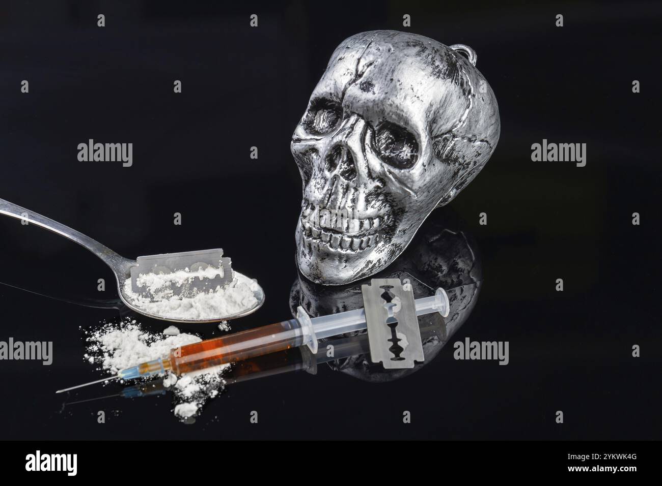 Drug addiction and death from overdose concept. Spoon with heroin ...