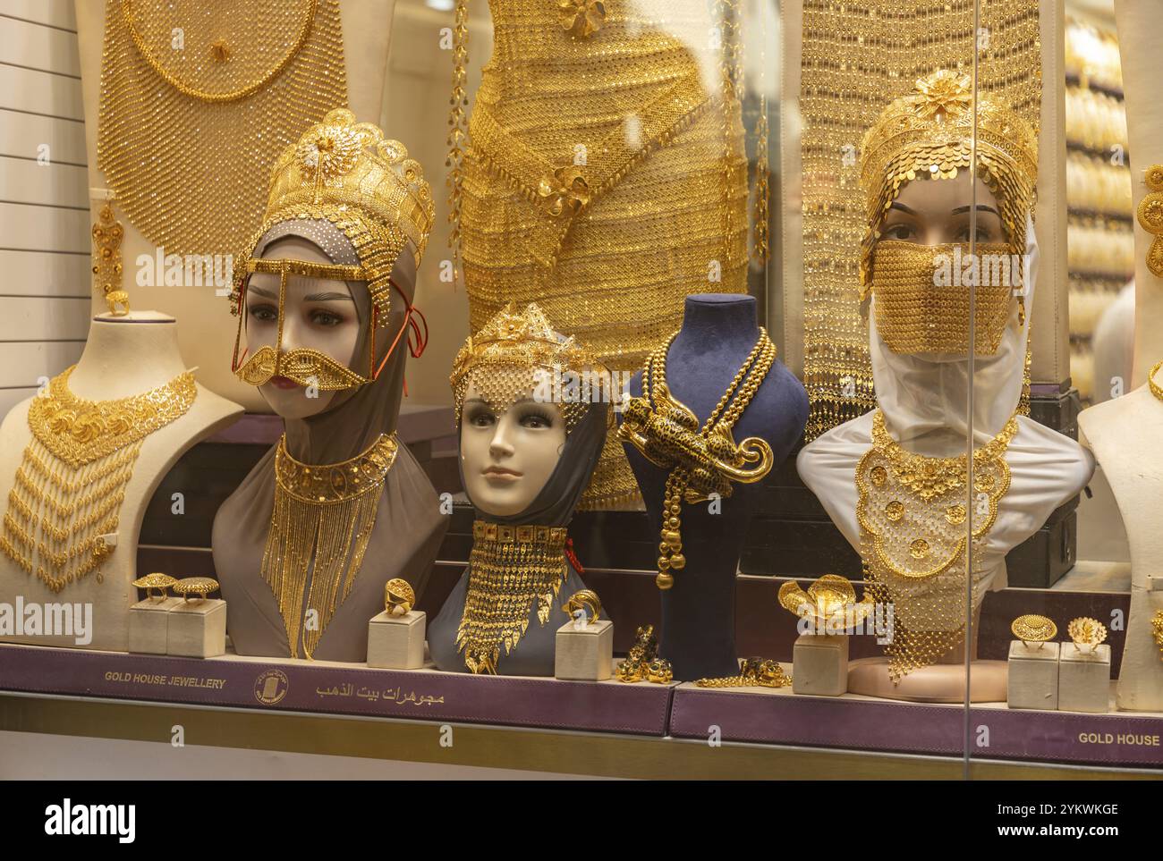 A picture of women's jewelry on a storefront at the Dubai Gold Souk ...