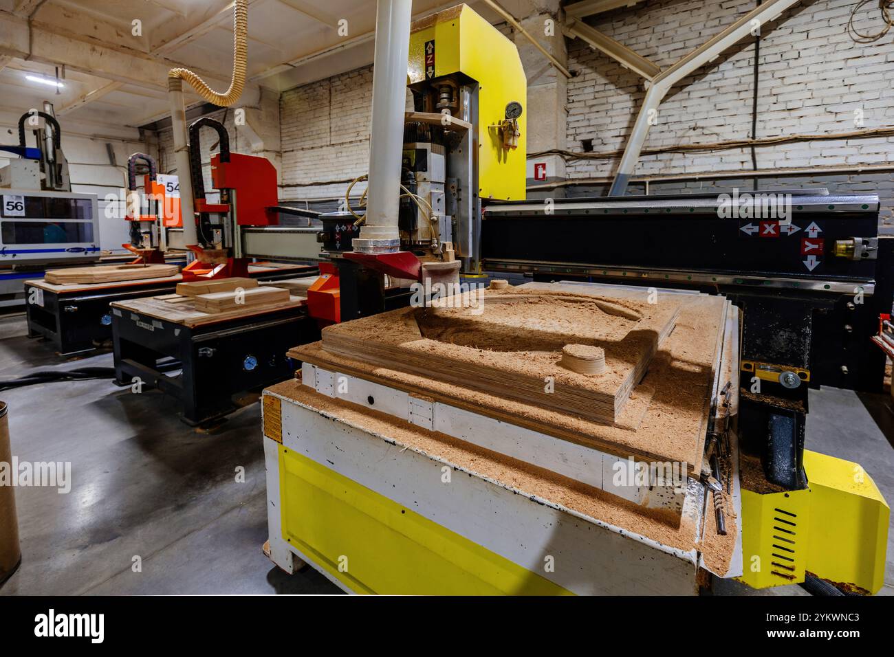 Woodworking workshop. Automated CNC drilling and milling machines Stock Photo - Alamy