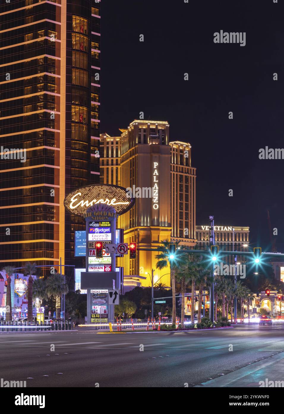 A picture of the South Las Vegas Boulevard at night, with parts of the ...