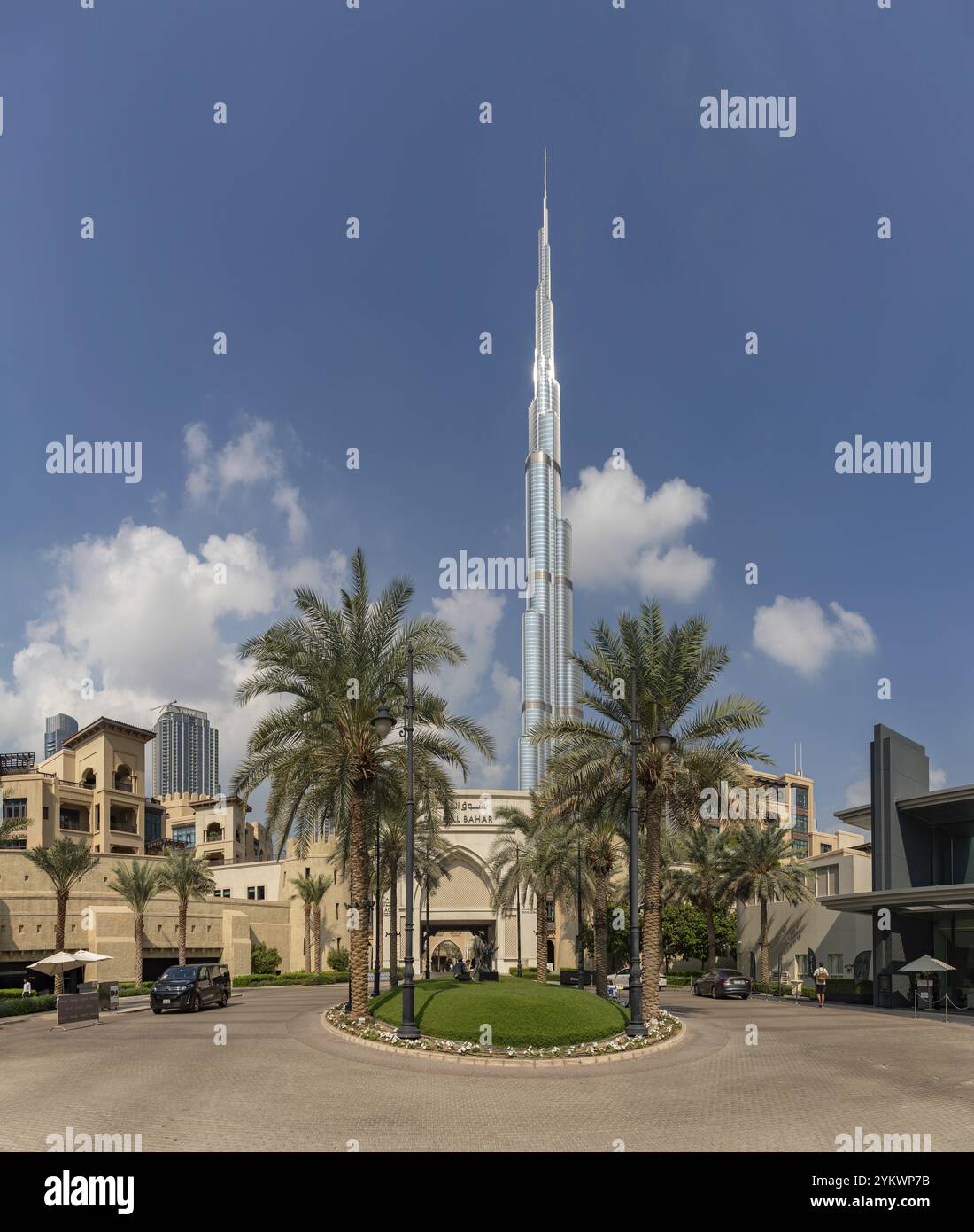 A picture of the Burj Khalifa towering above the Souk Al Bahar shopping ...