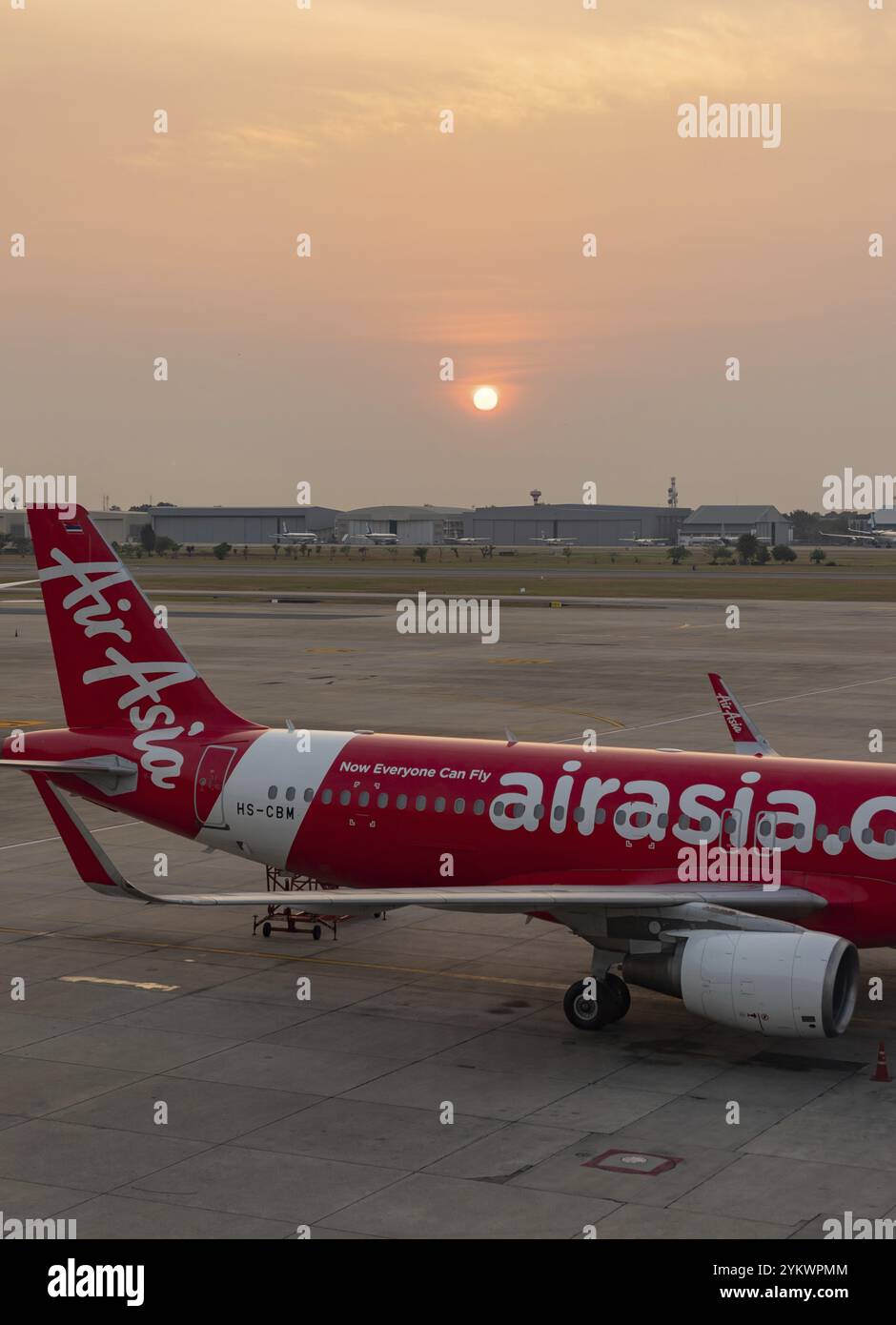 A picture of an AirAsia plane at sunrise Stock Photo - Alamy