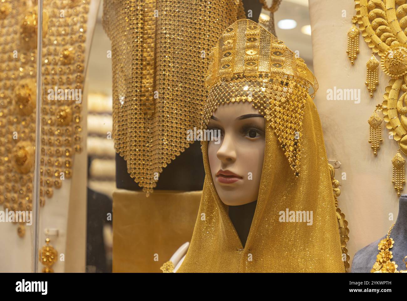 A picture of women's jewelry on a storefront at the Dubai Gold Souk ...