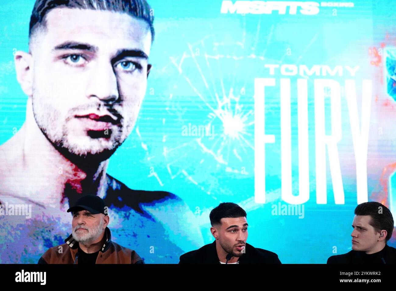 John Fury (left), father of Tommy Fury (centre), and Ben Davies during ...