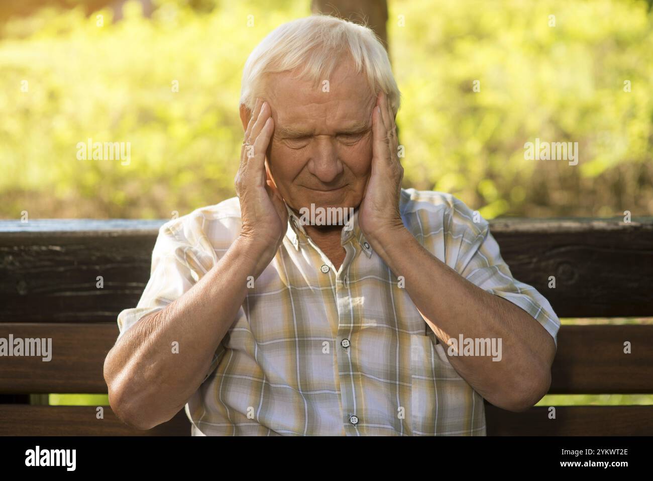 Old man holding his head. Elderly person has headache. Health is in ...