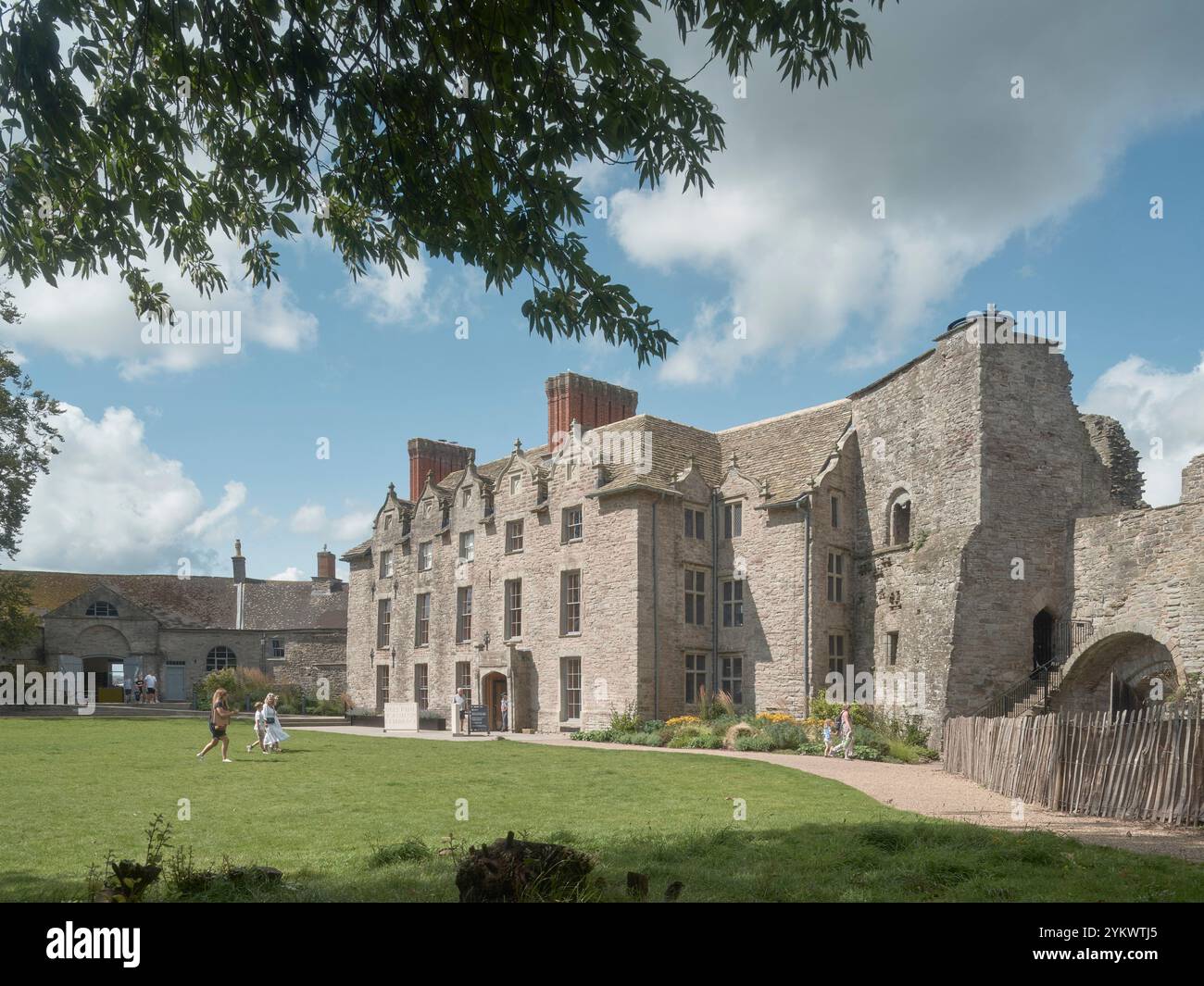 View of castle grounds and main entrance with visitors arriving. Hay ...