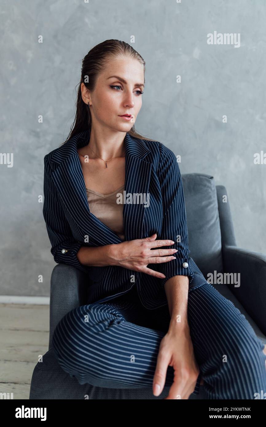 Business woman in tailored suit hi-res stock photography and images - Alamy