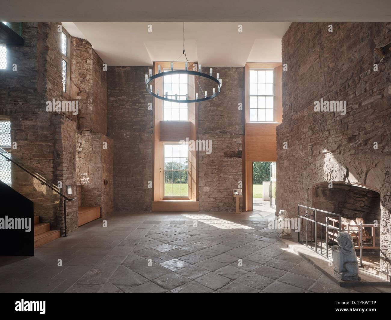 Double-height Great Hall with fireplace. Hay Castle, Hay-on-Wye, United ...