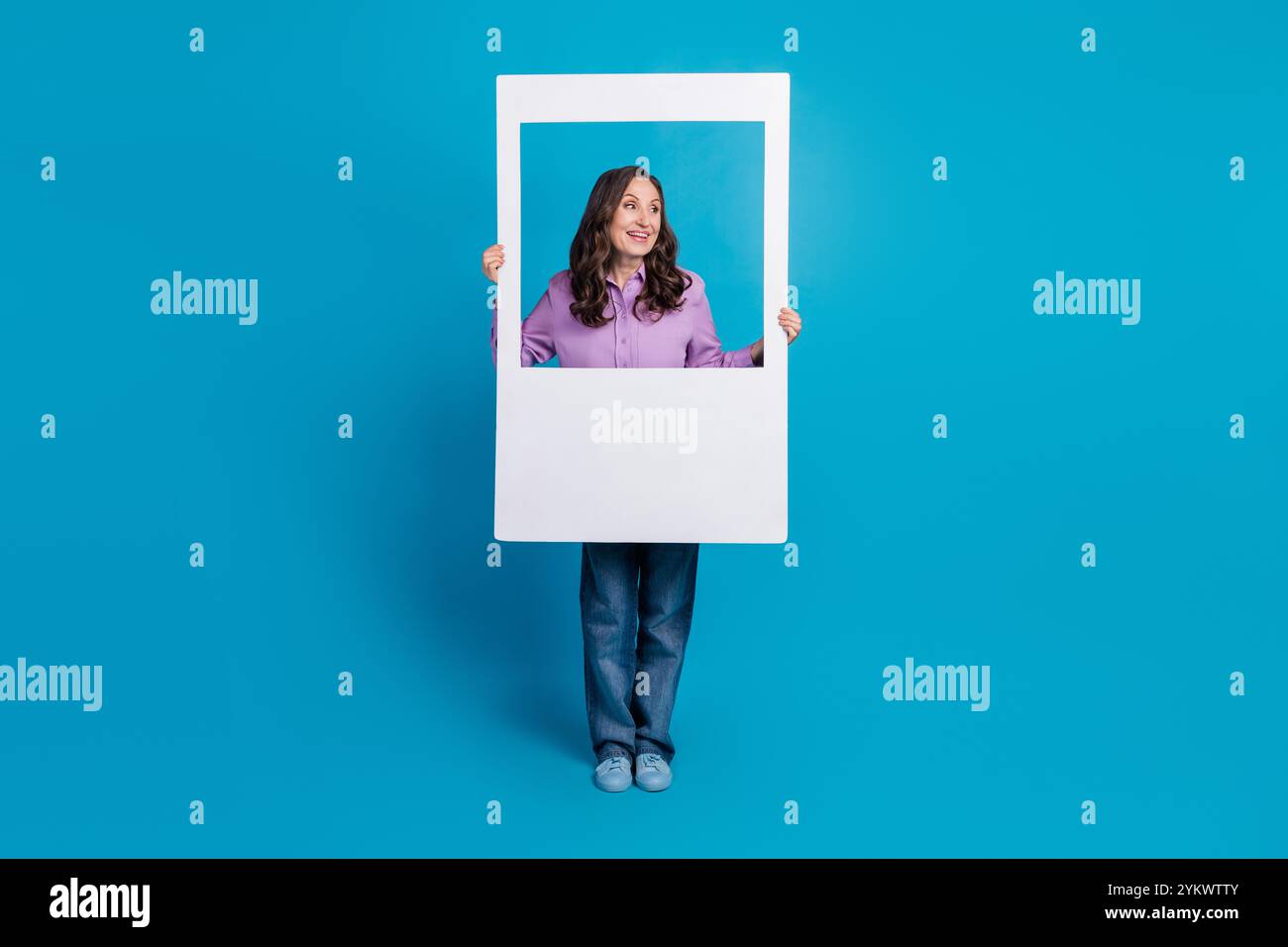 Full length photo of cheerful pretty lady dressed puple blouse tacking ...