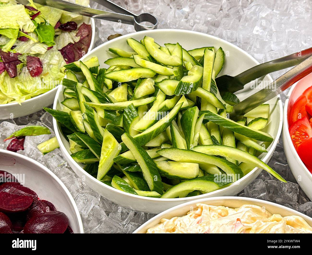 Bowl of freshly cut cucumber on a salad buffet in a restaurant Stock ...