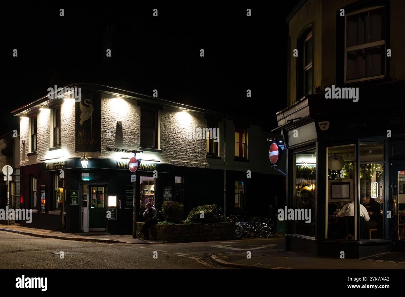 A night time exterior view of The White Swan pub on Mill Road ...