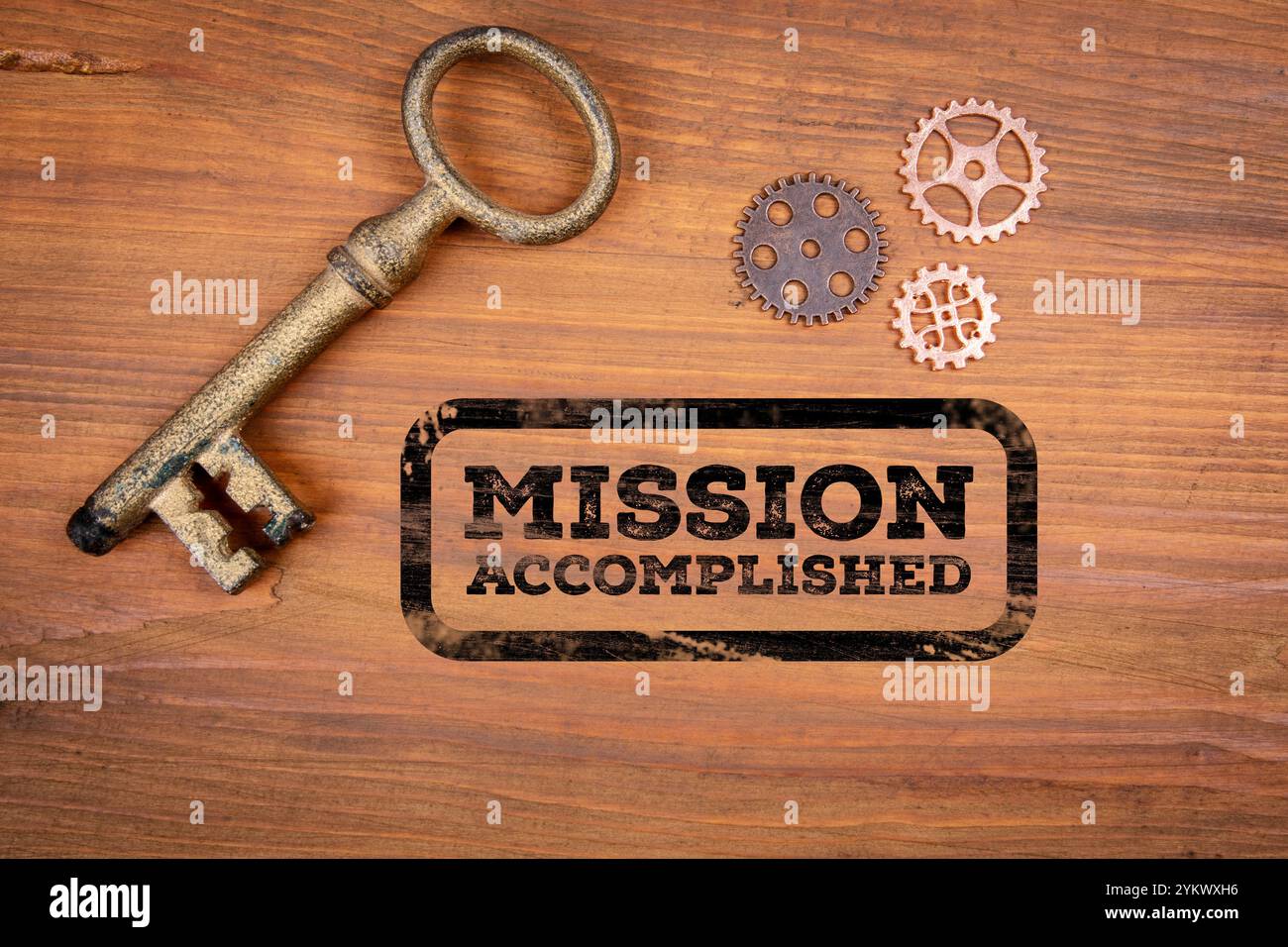 Mission Accomplished. Text printed with a stamp on a wood texture ...