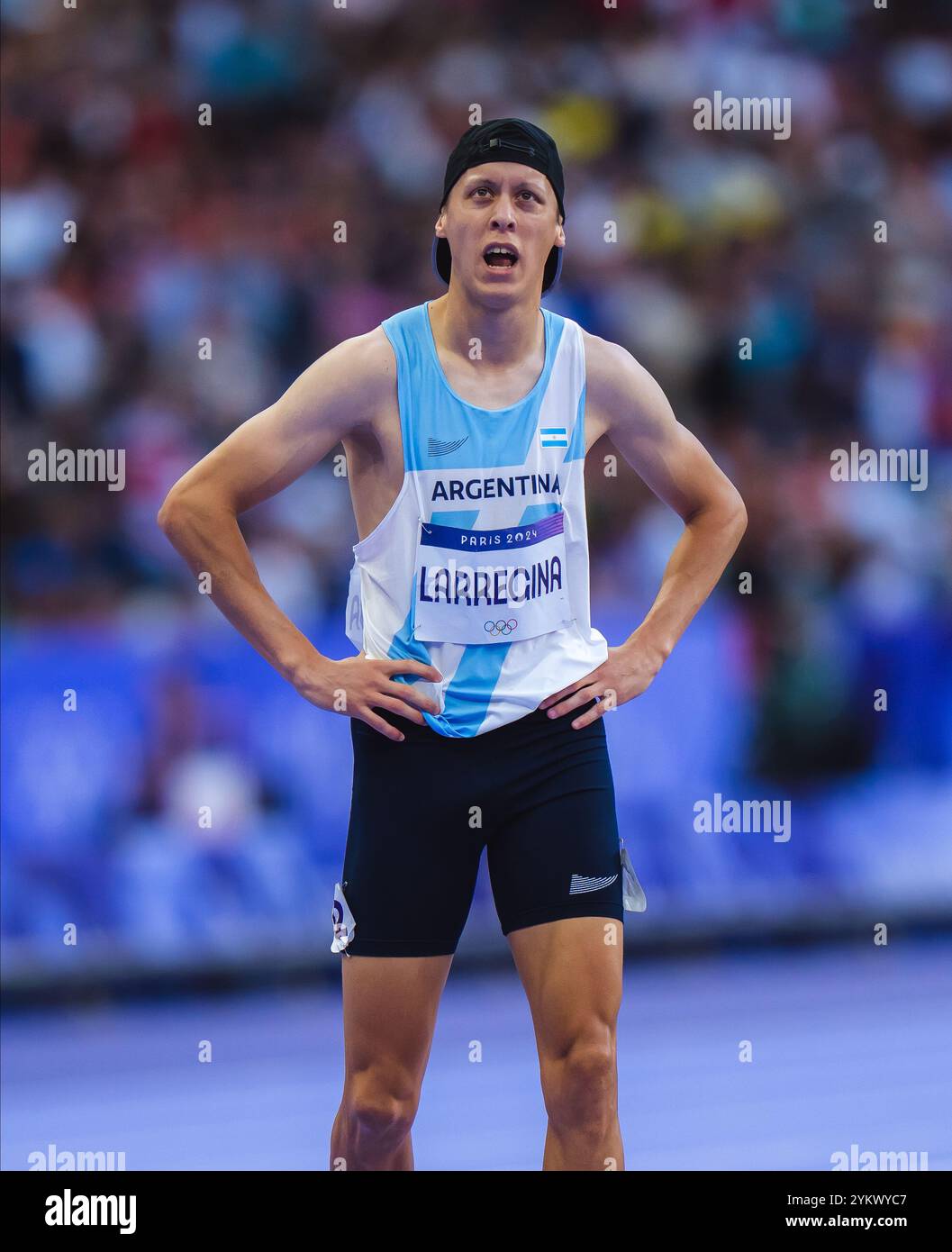 Elián Larregina participating in the 400 meters relay at the Paris 2024 ...