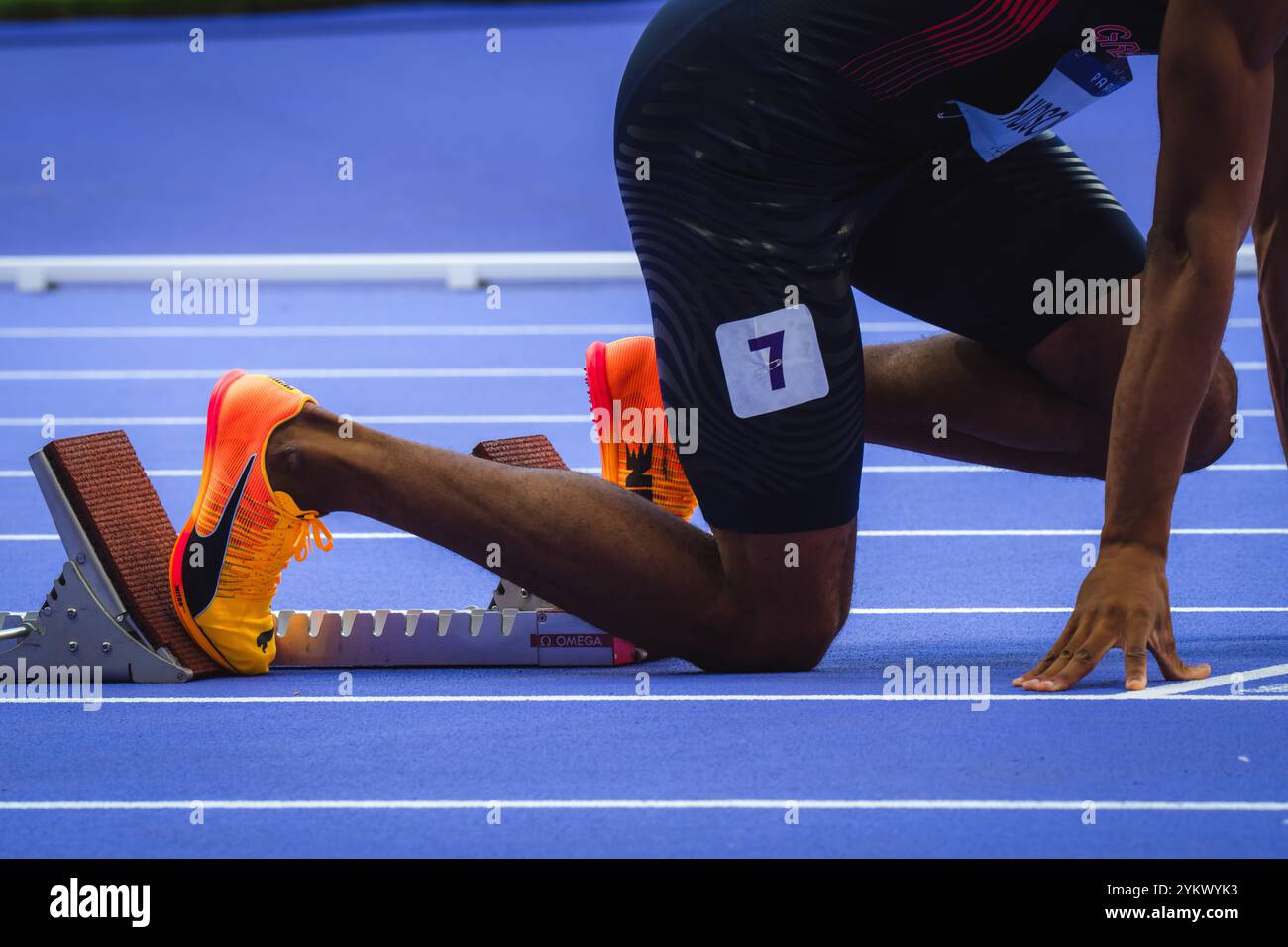 Orange Puma athletic shoes in the 400 meters at the Paris 2024 Olympic ...