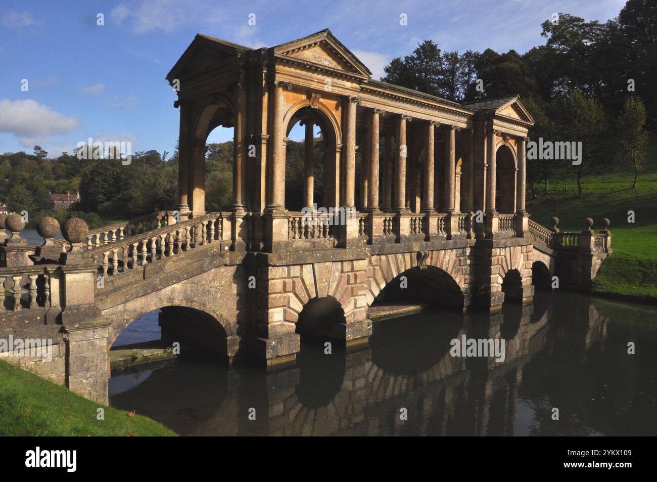 The Palladian bridge, in the autumn sunshine, over the lake in Priory ...