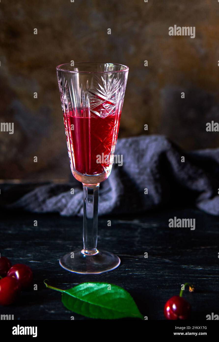 Homemade cherry alcohol drink liquor with fresh cherry berries ...