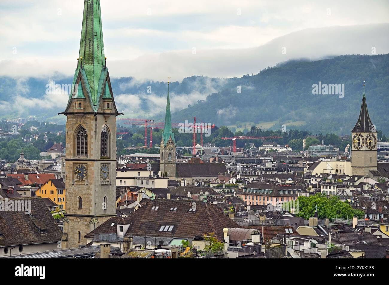 Church clock towers in old town Zurich,cloudy morning,Switzerland Stock ...