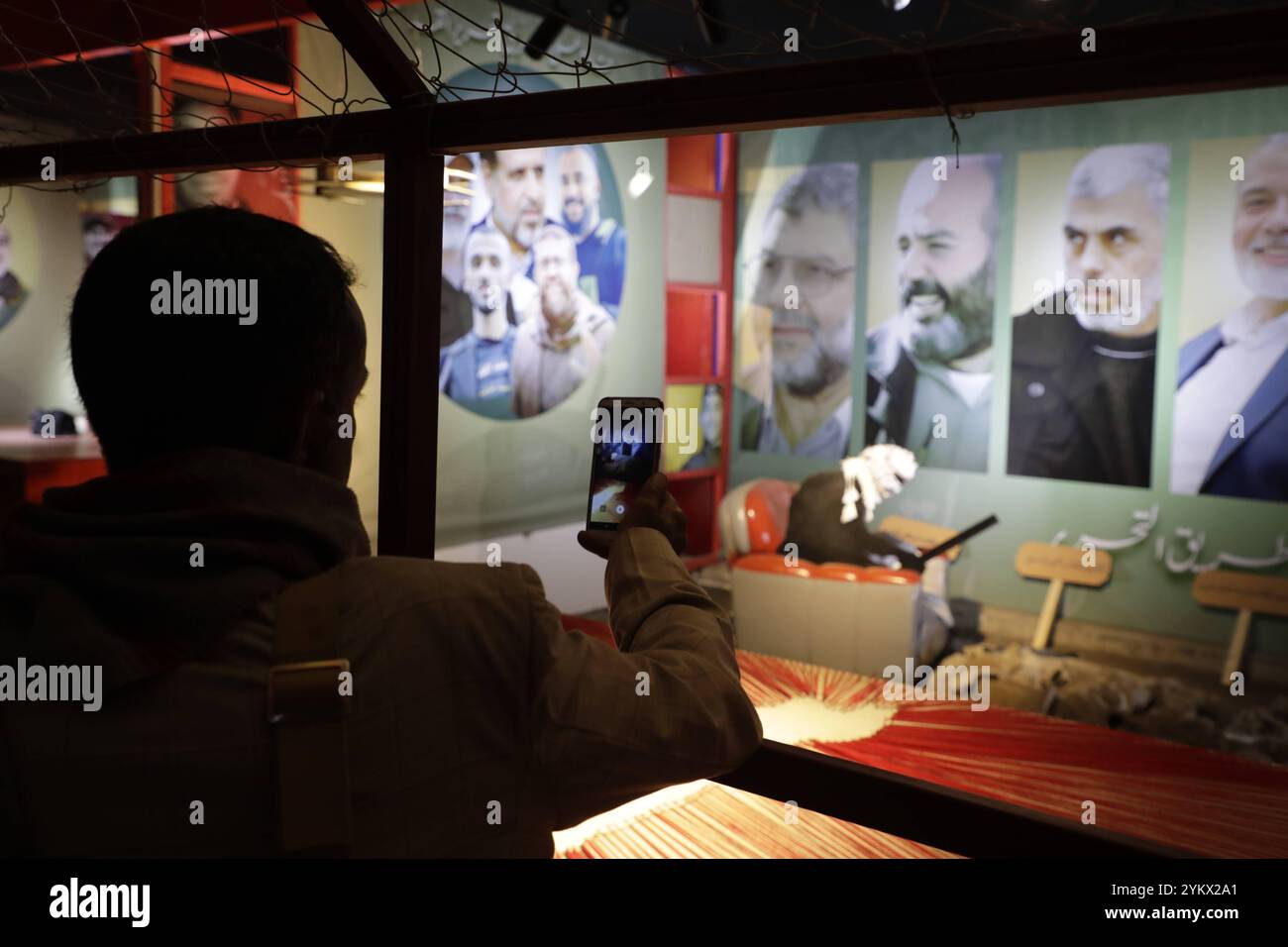 YEMEN HOUTHIS DRONE EXHIBITION A person takes photos of a statue of ...