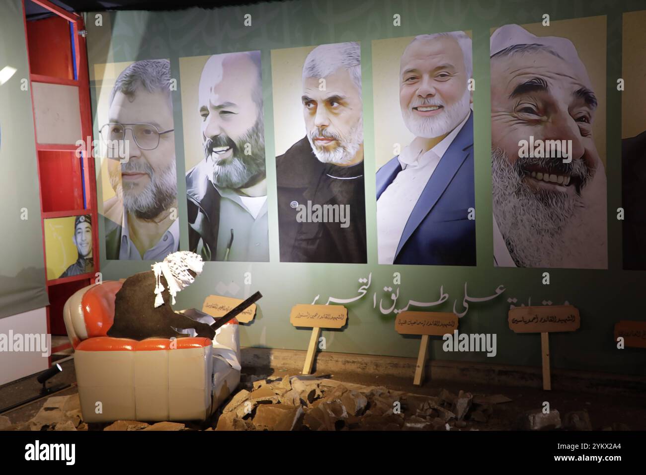 YEMEN HOUTHIS DRONE EXHIBITION A statue of Yahya Sinwar sitting in a ...