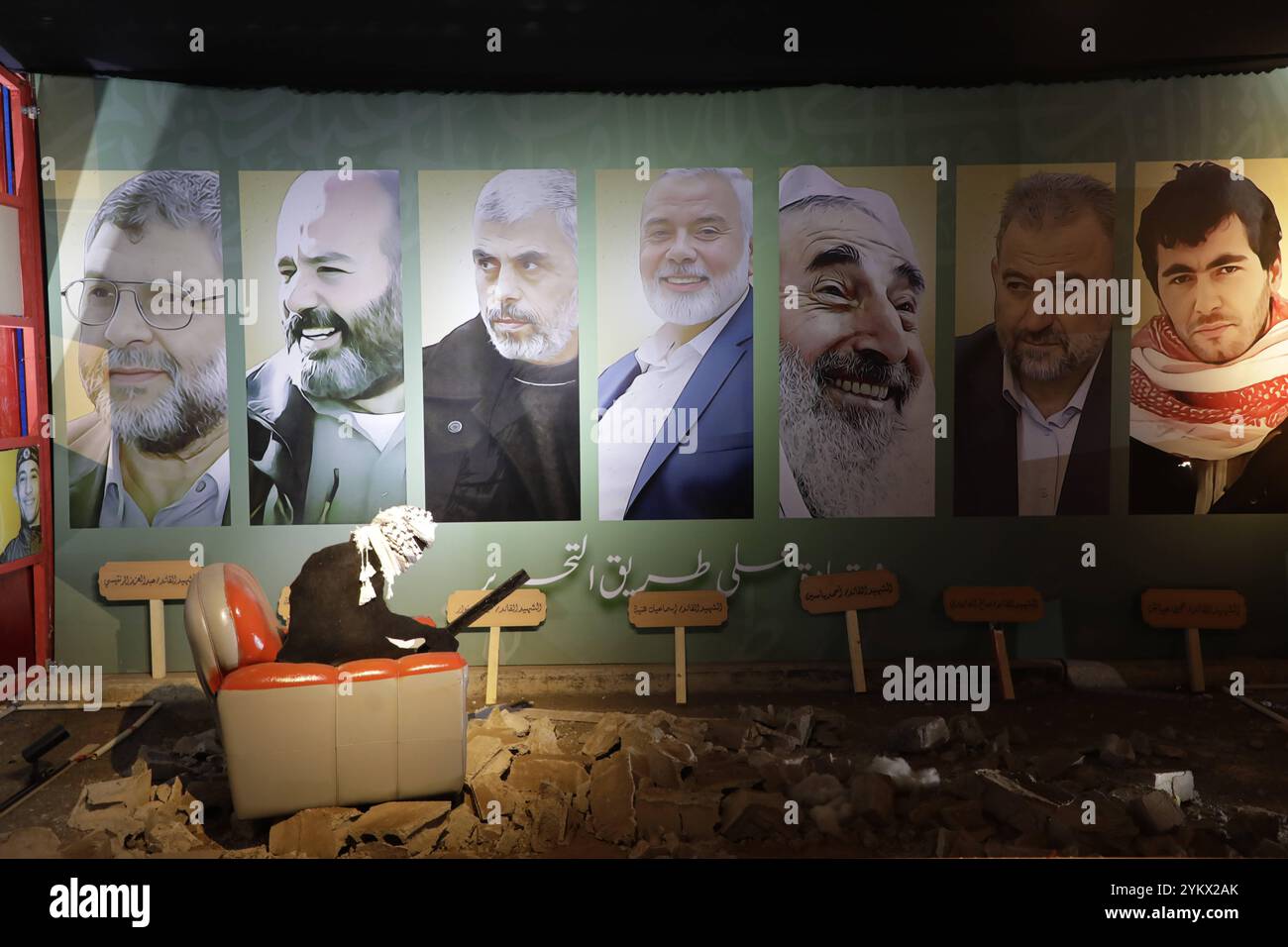 YEMEN HOUTHIS DRONE EXHIBITION A statue of Yahya Sinwar sitting in a ...