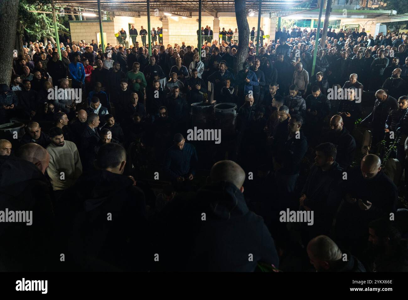 Muslim worshippers pray during the funeral of Safaa Awad, 41, at the ...